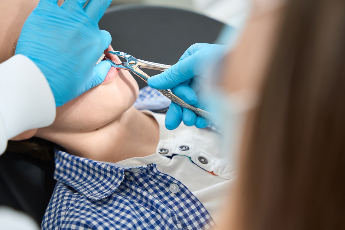 What to Expect During a Tooth Extraction Under Sedation - Braasch Oral ...